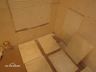 Tile Falls Off Wall